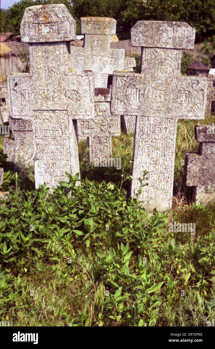 Copuzu, Ialomița County, Romania, 2000. The local cemetery, with many ...
