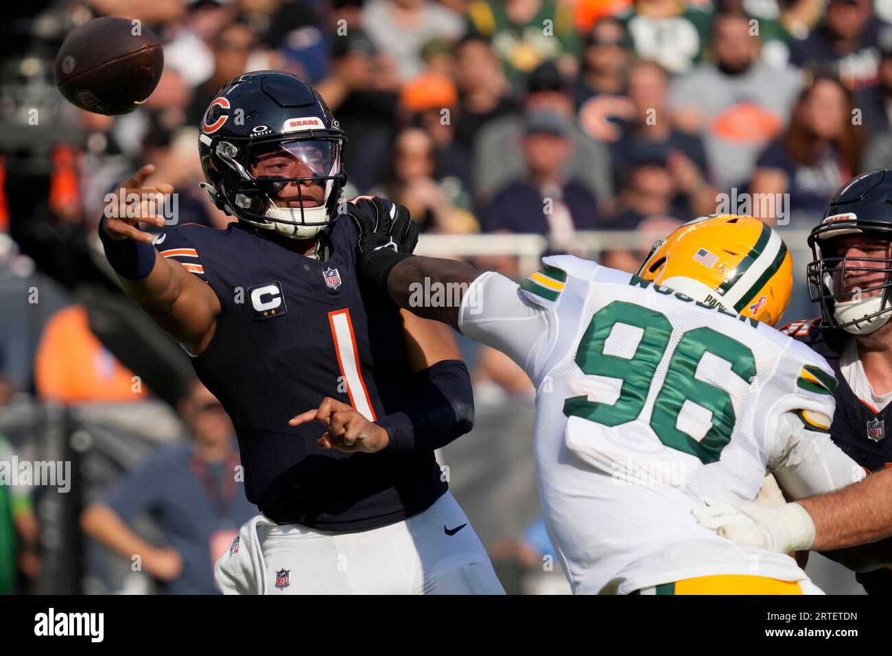Chicago Bears quarterback Justin Fields throws a pass against the Green ...
