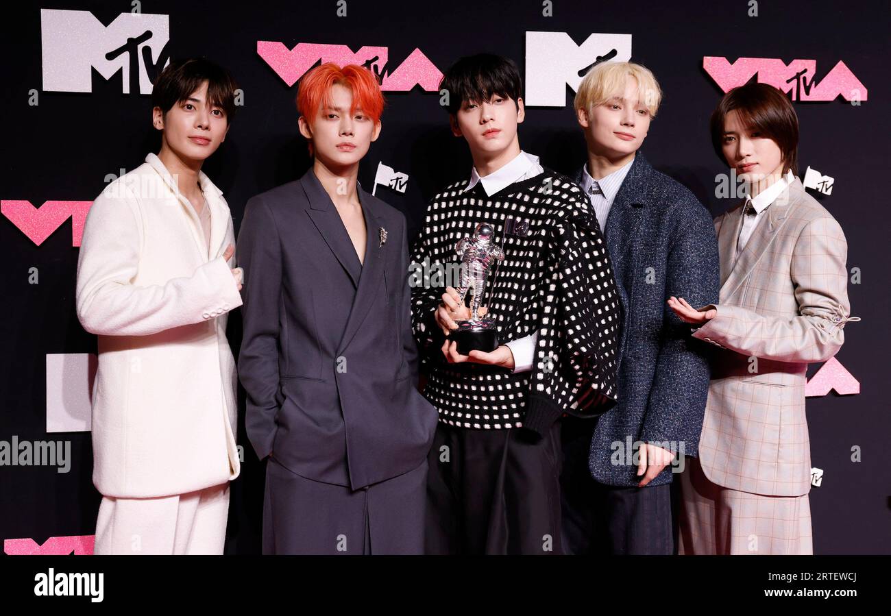 Newark, United Stated. 12th Sep, 2023. Tomorrow X Together pose with a ...