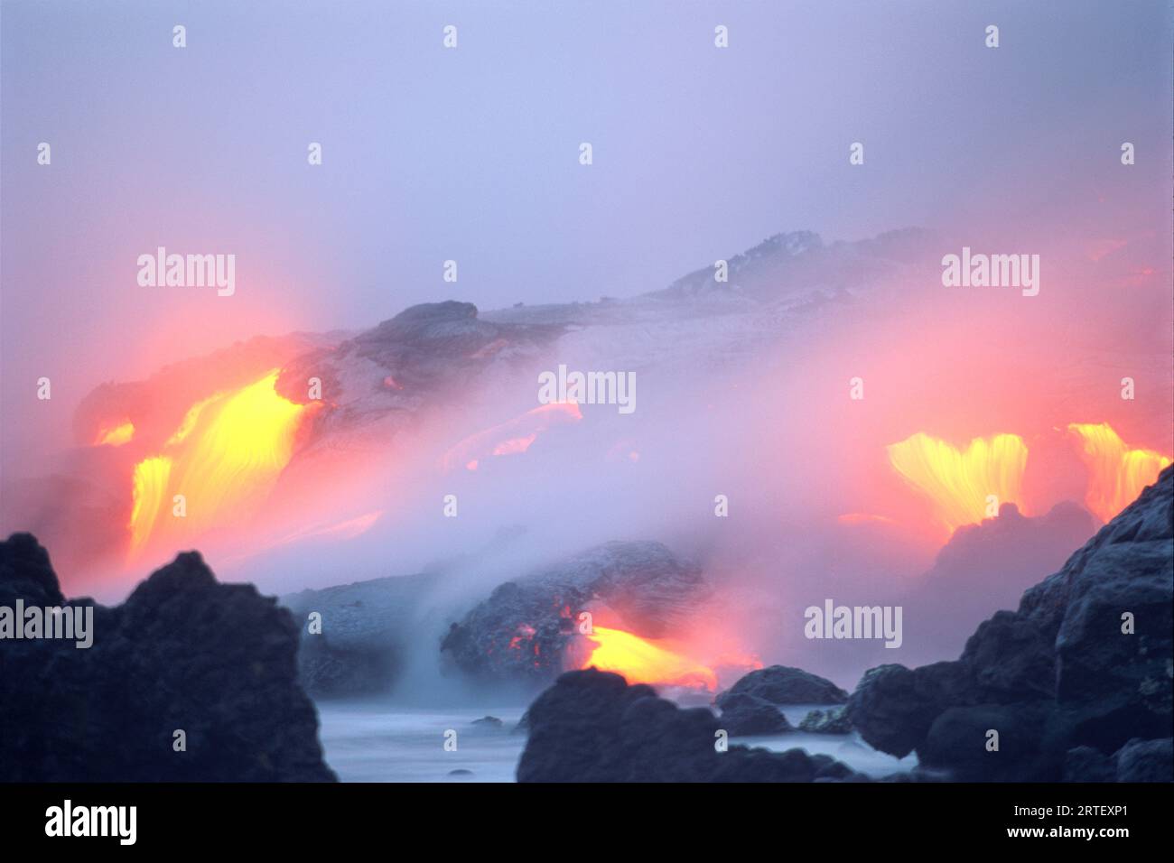 Hawaii, Big Island, Glowing Orange Lava Flow Into Ocean, Gray Smoky Sky ...