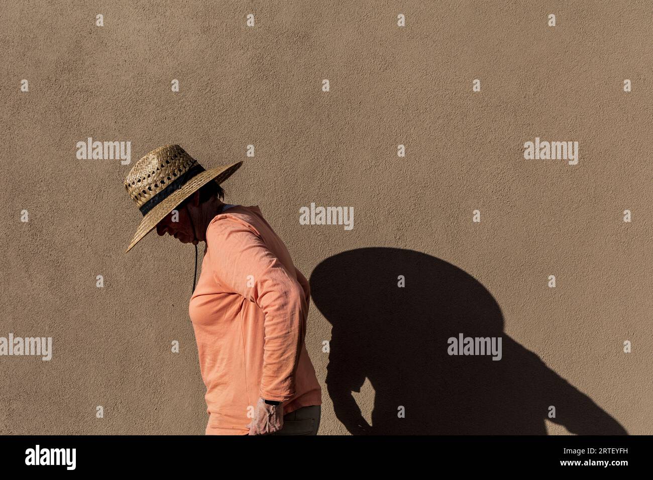 Woman casting shadow hi-res stock photography and images - Alamy