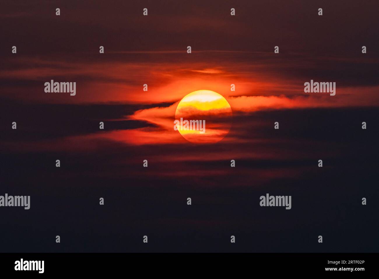 Setting sun seen above mountains near Sun Valley Stock Photo - Alamy
