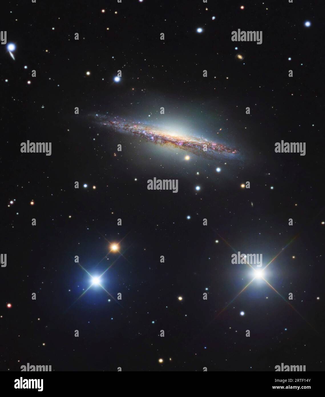 Edge-on spiral galaxy NGC 105, composite image Stock Photo - Alamy