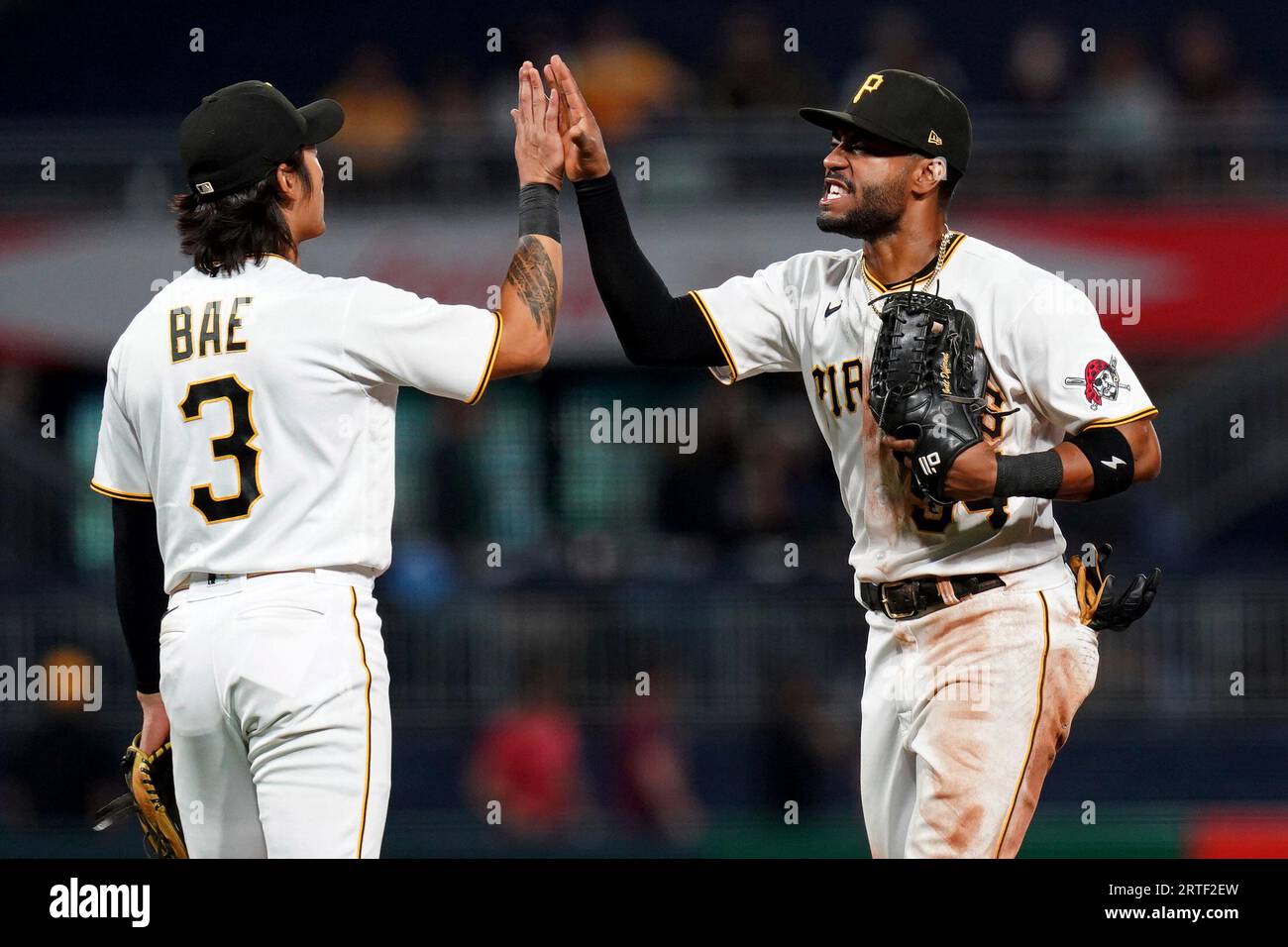 Pittsburgh Pirates second baseman Ji Hwan Bae, left, and right fielder ...