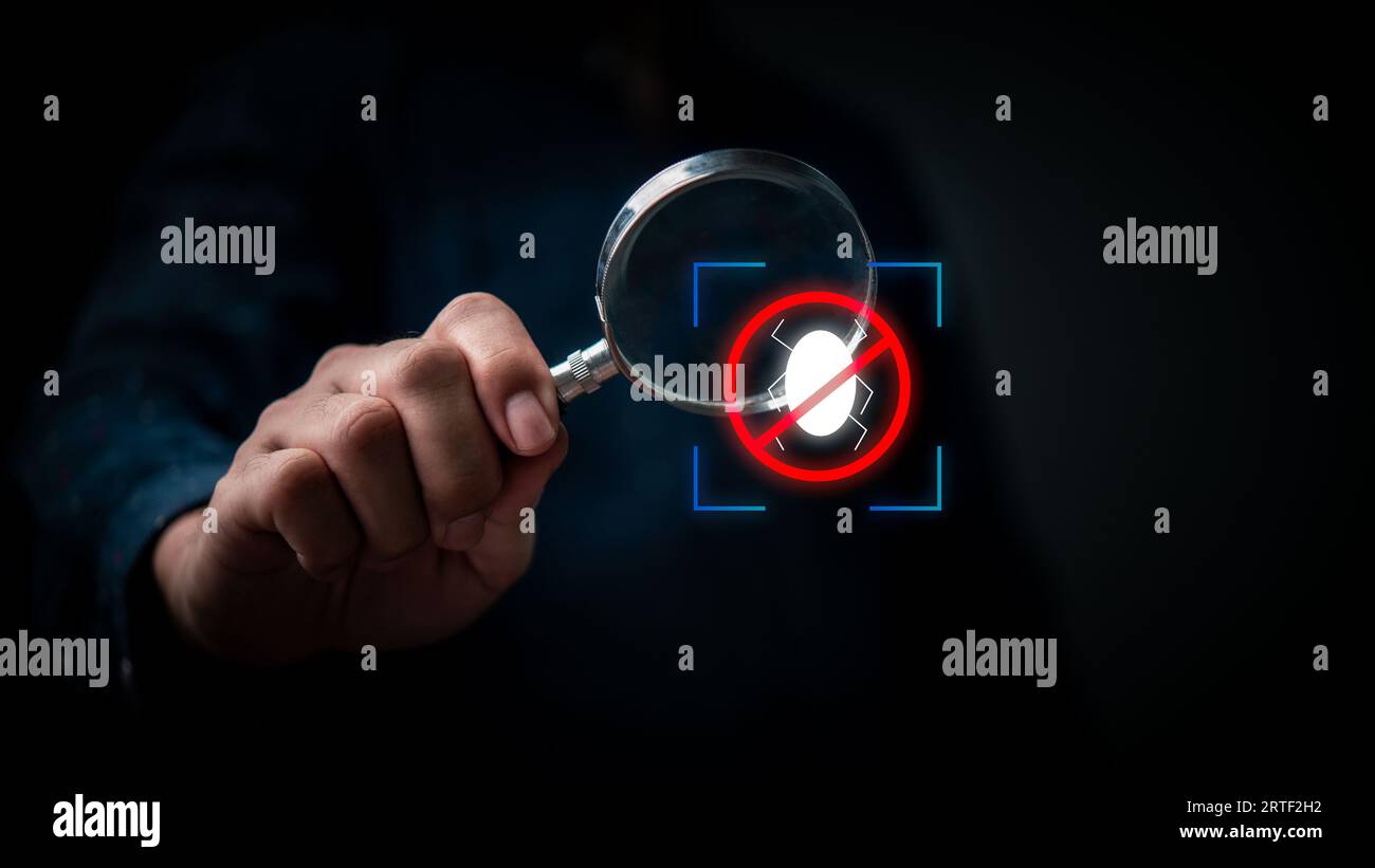 Hand holding a magnifying glass antivirus and spyware hacker icon.Theft ...