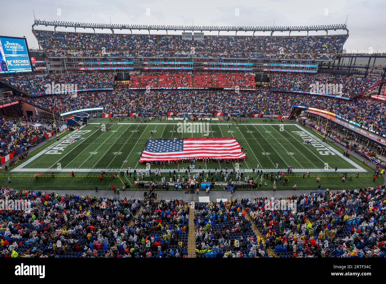 A general view of Gillette Stadium as a giant American flag is unveiled ...
