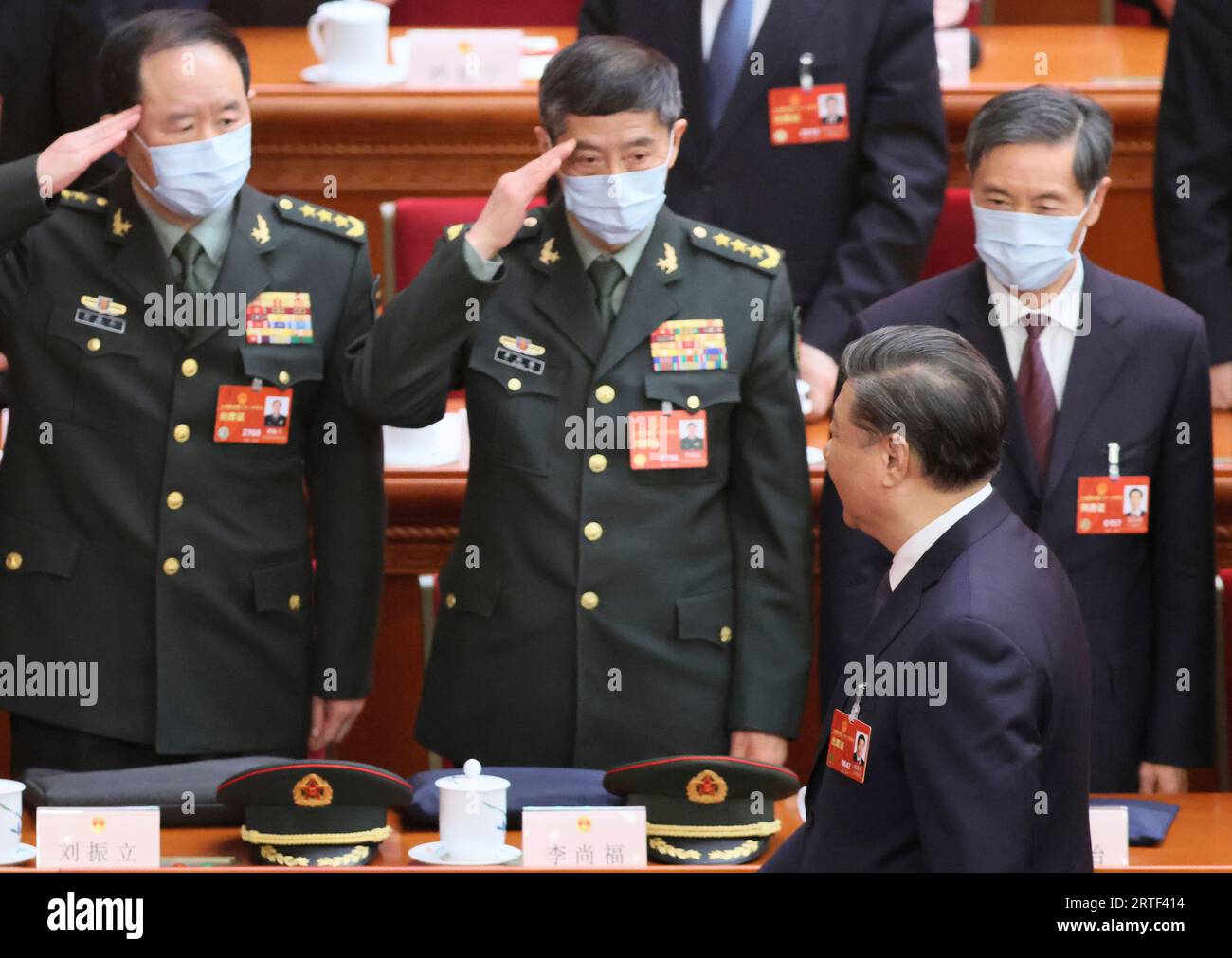 A file photo shows China's Defense Minister Li Shangfu saluting ...