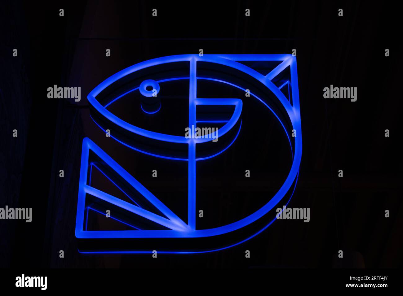 Electric blue fish sign Stock Photo - Alamy