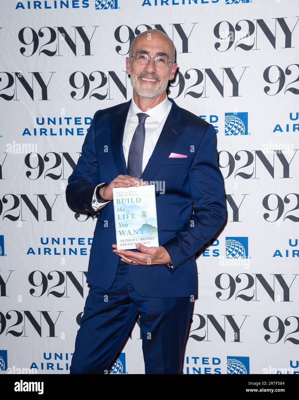 Arthur C. Brooks poses backstage before discussing his new book ...