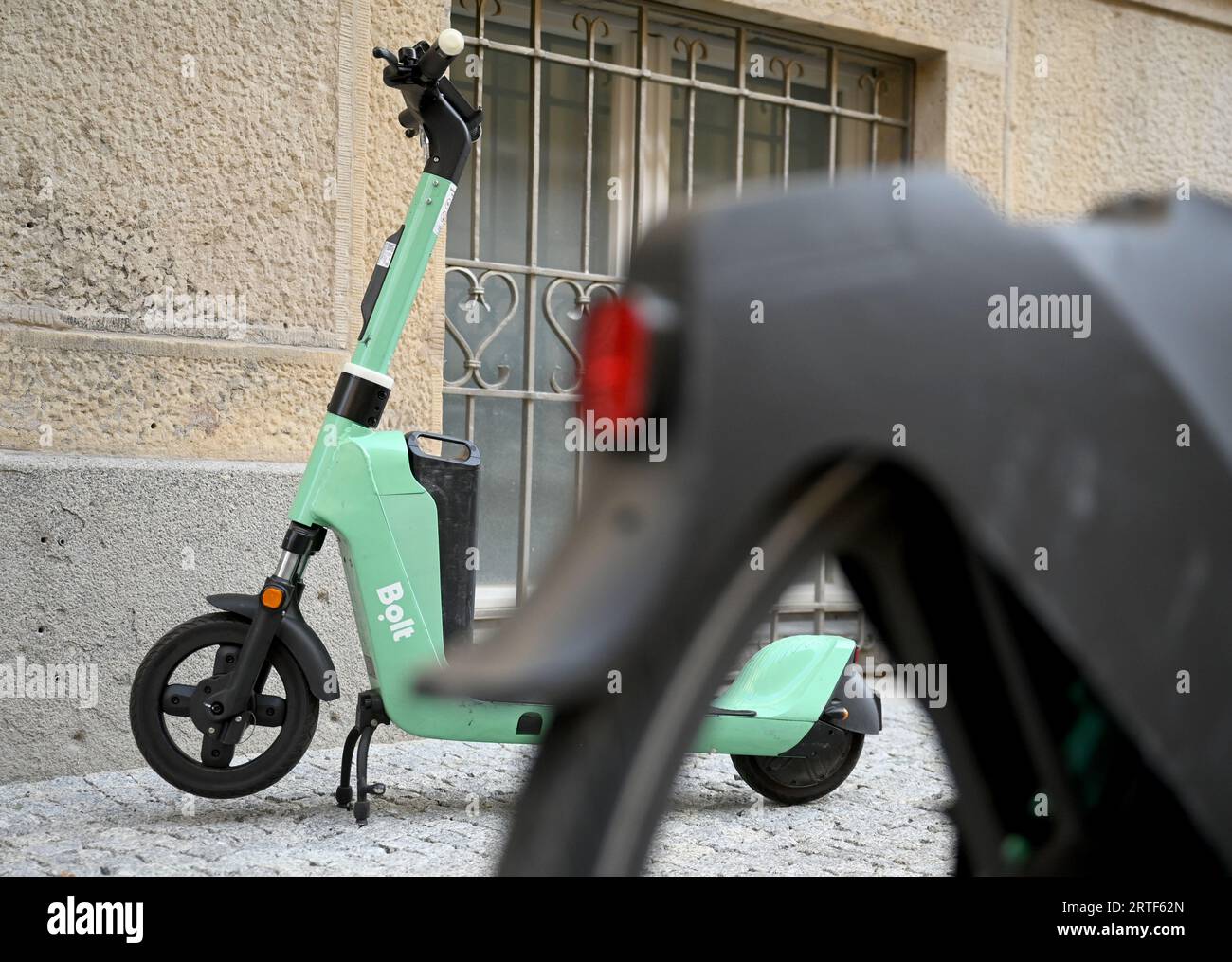 Berlin, Germany. 12th Sep, 2023. A "Bolt" e-scooter stands behind a ...