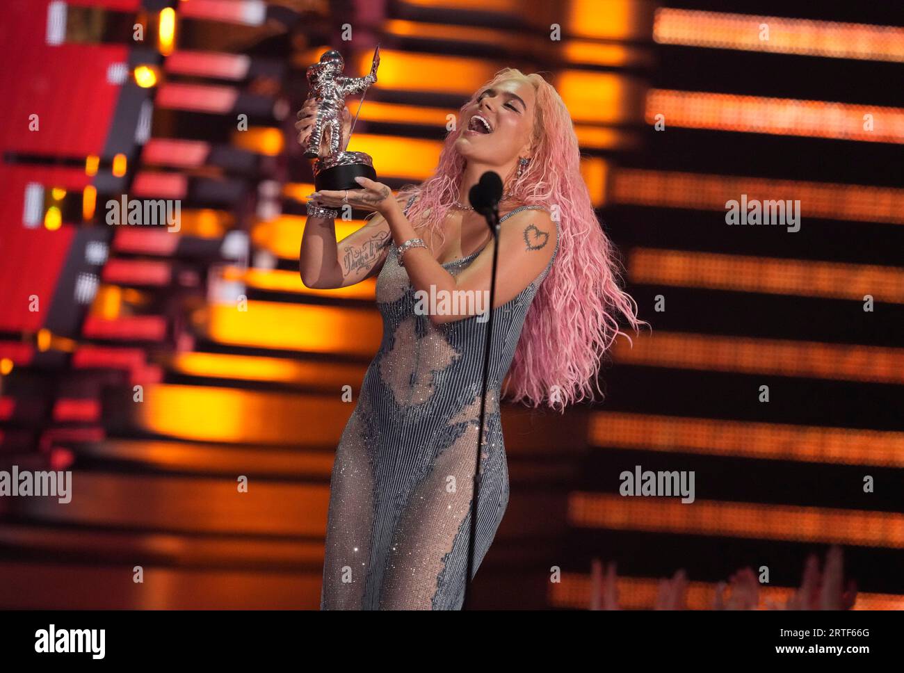 Karol G accepts the award for best collaboration for "TQG" during the ...