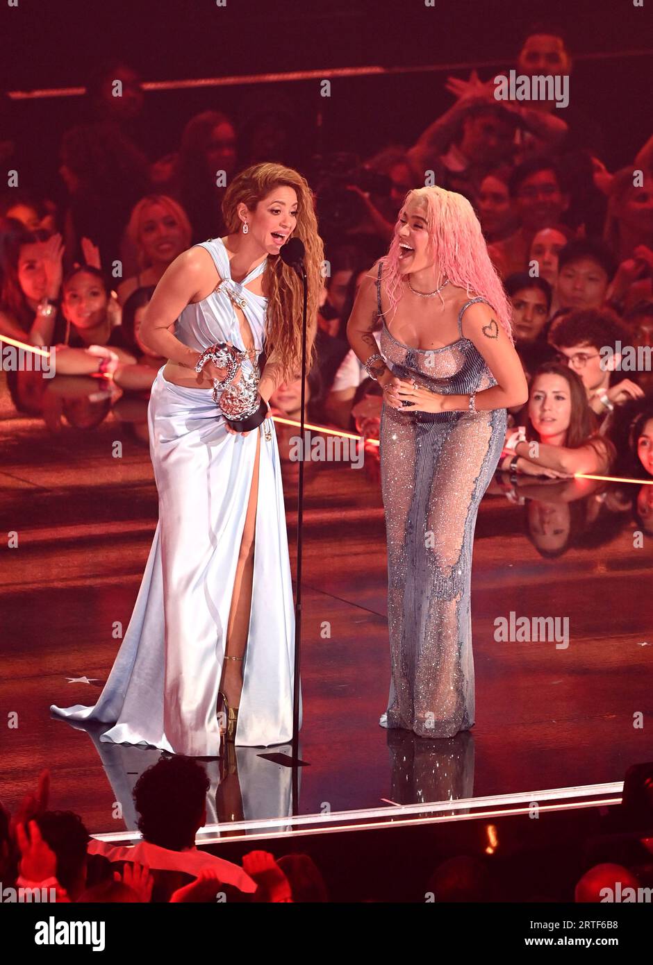 Shakira and Karol G on stage after winning the Best Collaboration award ...
