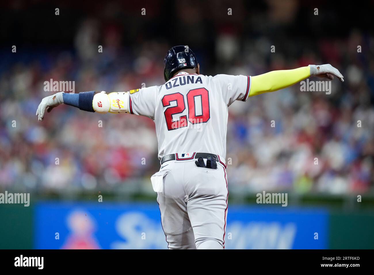 Atlanta Braves' Marcell Ozuna reacts after a home run during a baseball ...