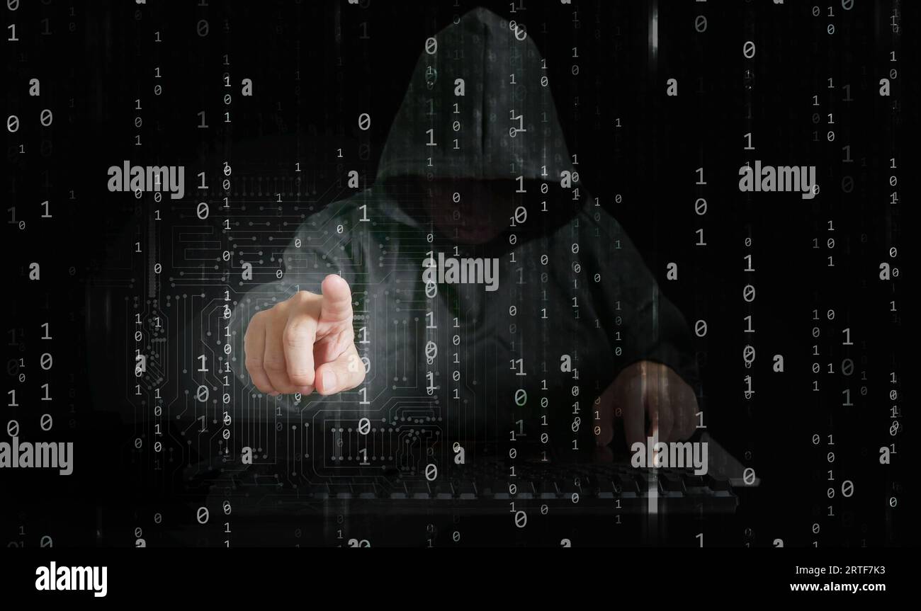 A hacker behind binary code, stream of data, able to break through ... A hacker behind binary code, stream of data, able to break through ...