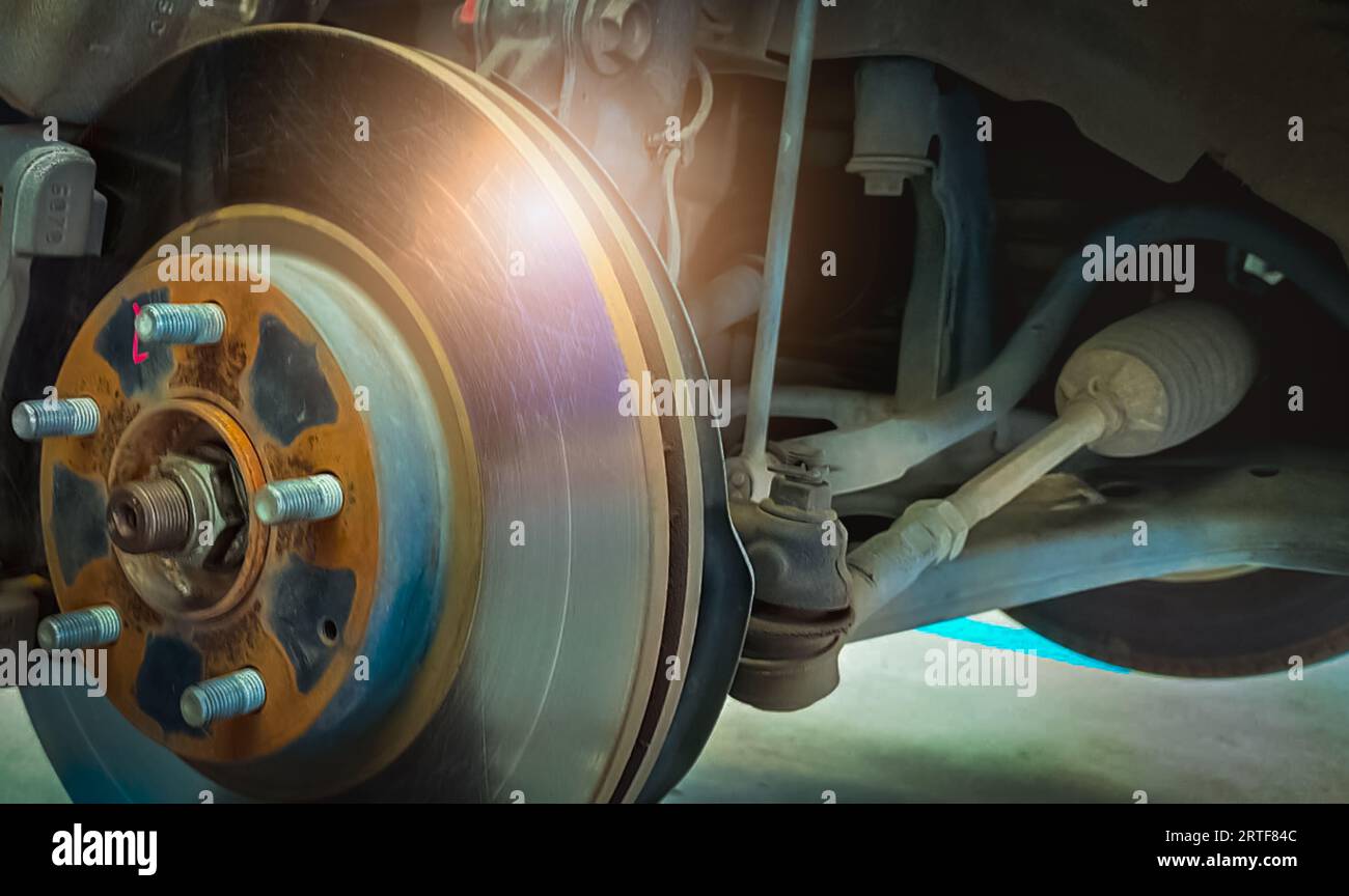 Car disc brake system. Car suspension in process of new tire ...