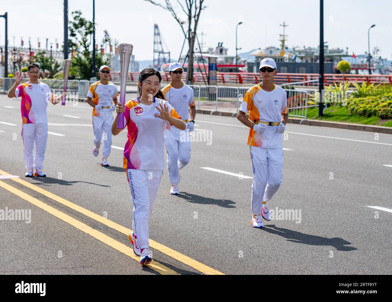 Zhoushan, China's Zhejiang Province. 13th Sep, 2023. Torch bearer Lin ...