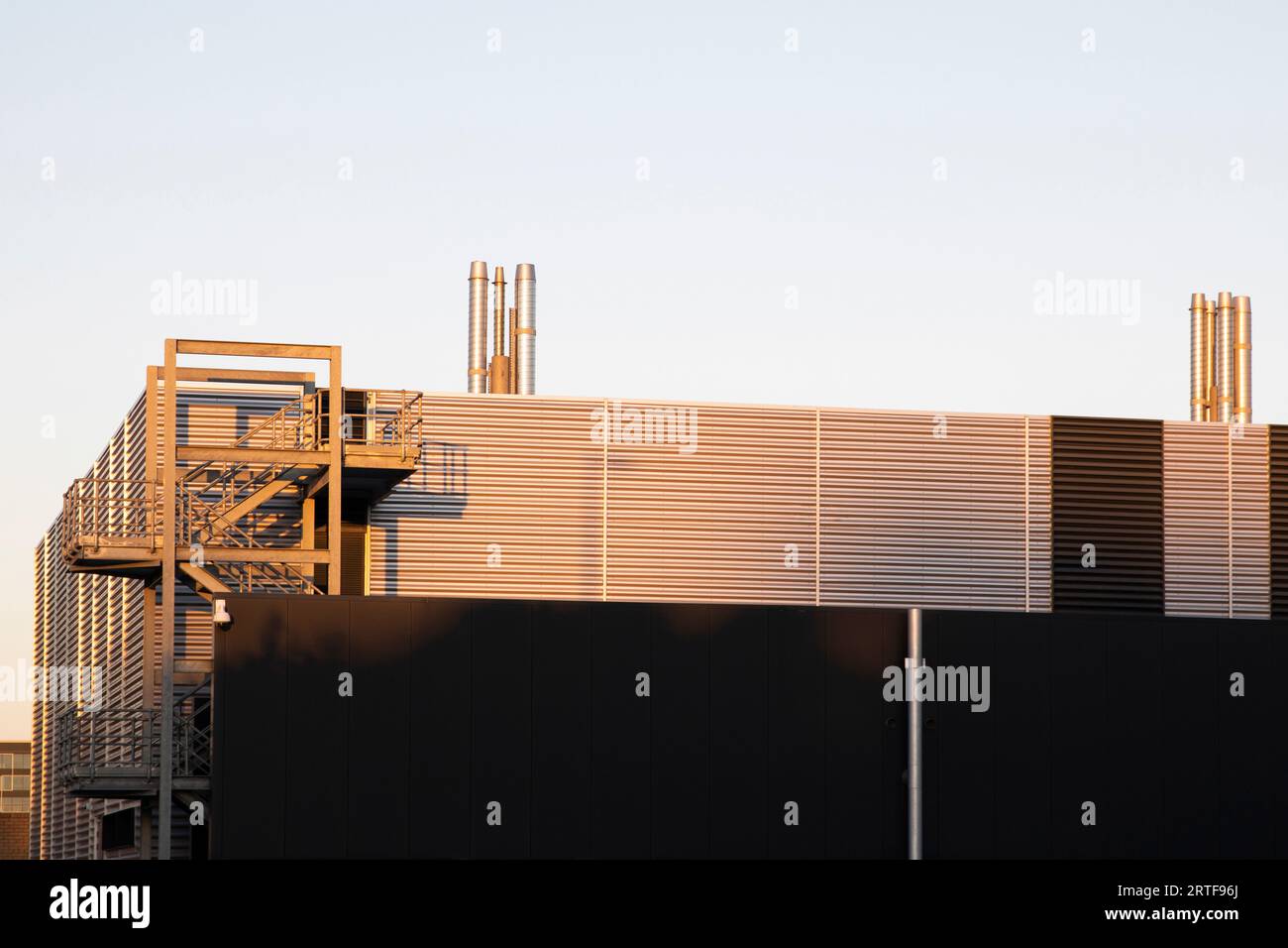 In the bright sunlight, the architectural details of a science lab are ...