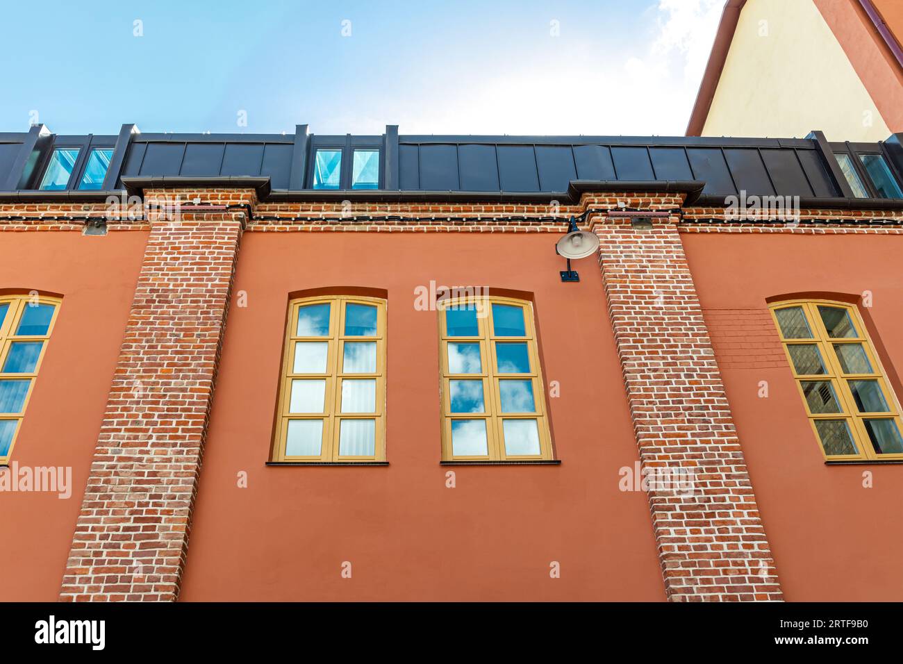 Red and blue building facade hi-res stock photography and images - Alamy