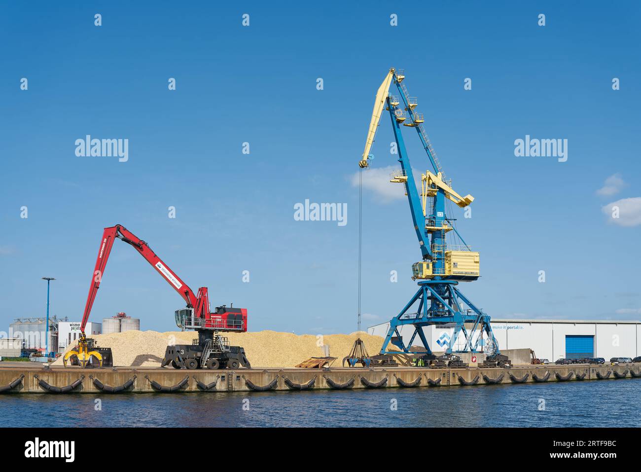 Cranes in the port of Wismar in Germany for loading and unloading ships ...