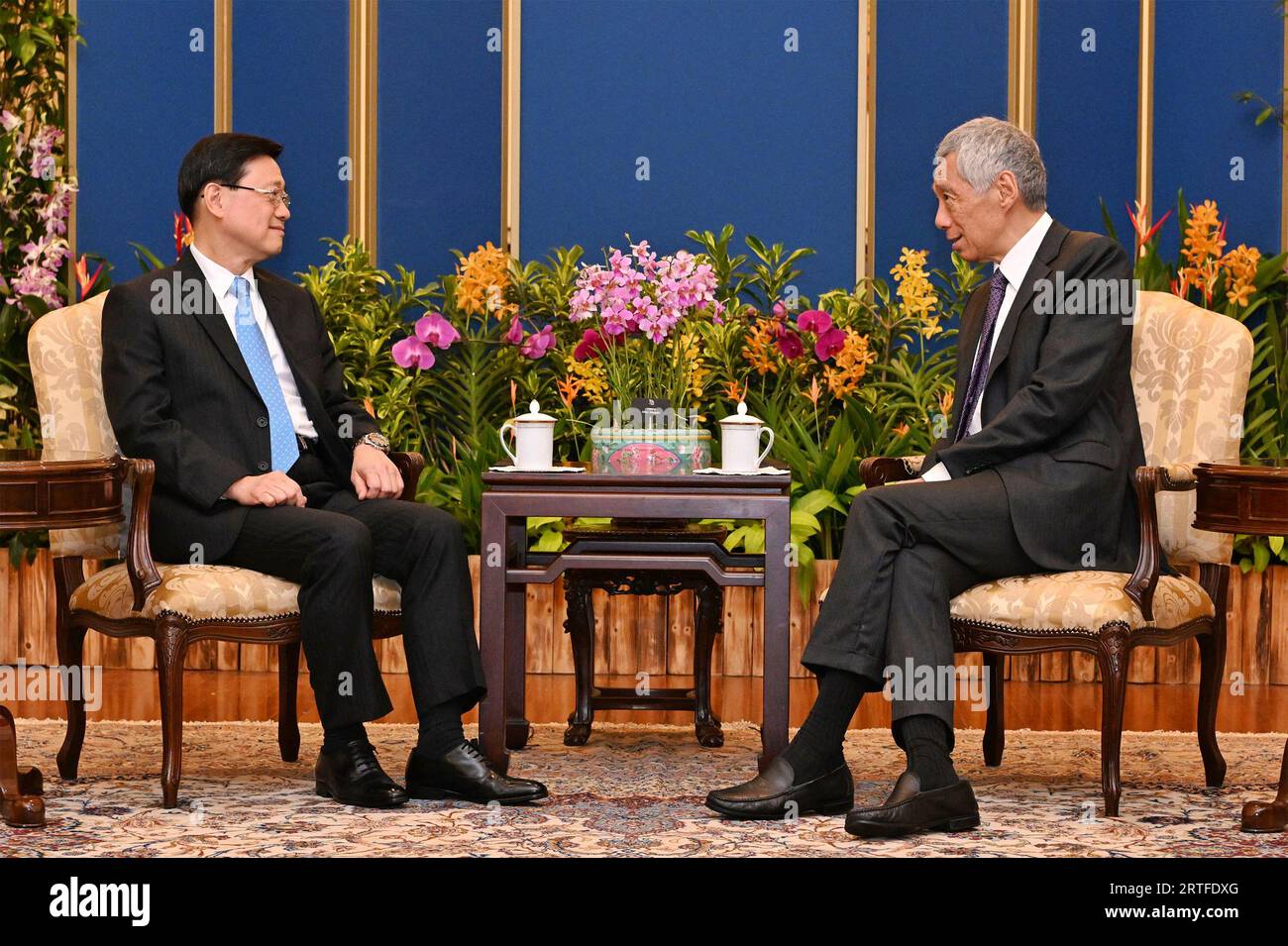 John Lee (left), Chief Executive of the Hong Kong Special ...