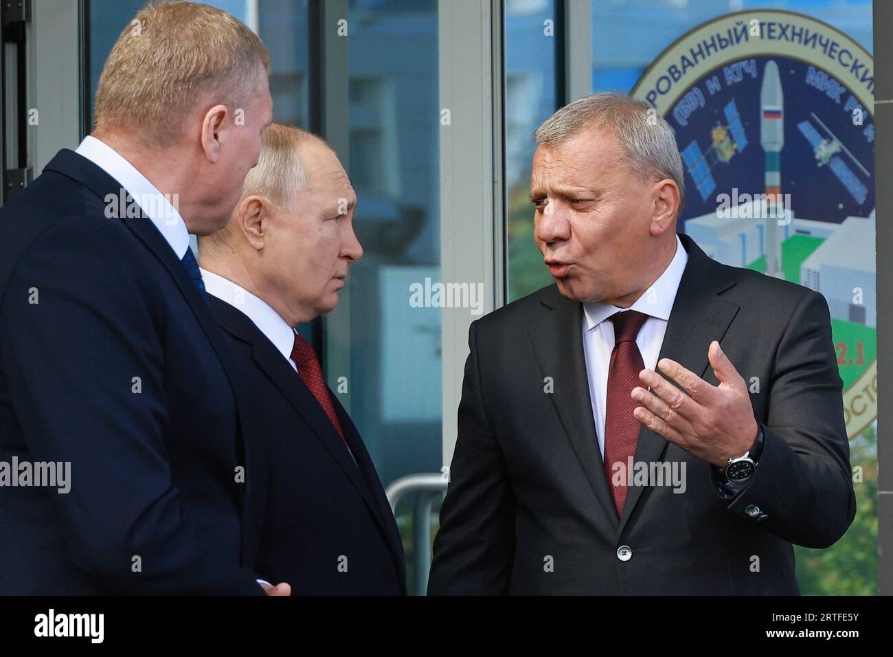Russian President Vladimir Putin, centre, speaks with Russian Federal ...