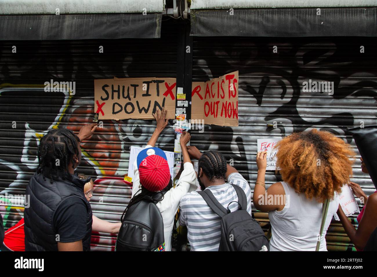 London, UK. 12th Sep, 2023. Protesters hold placards during the ...