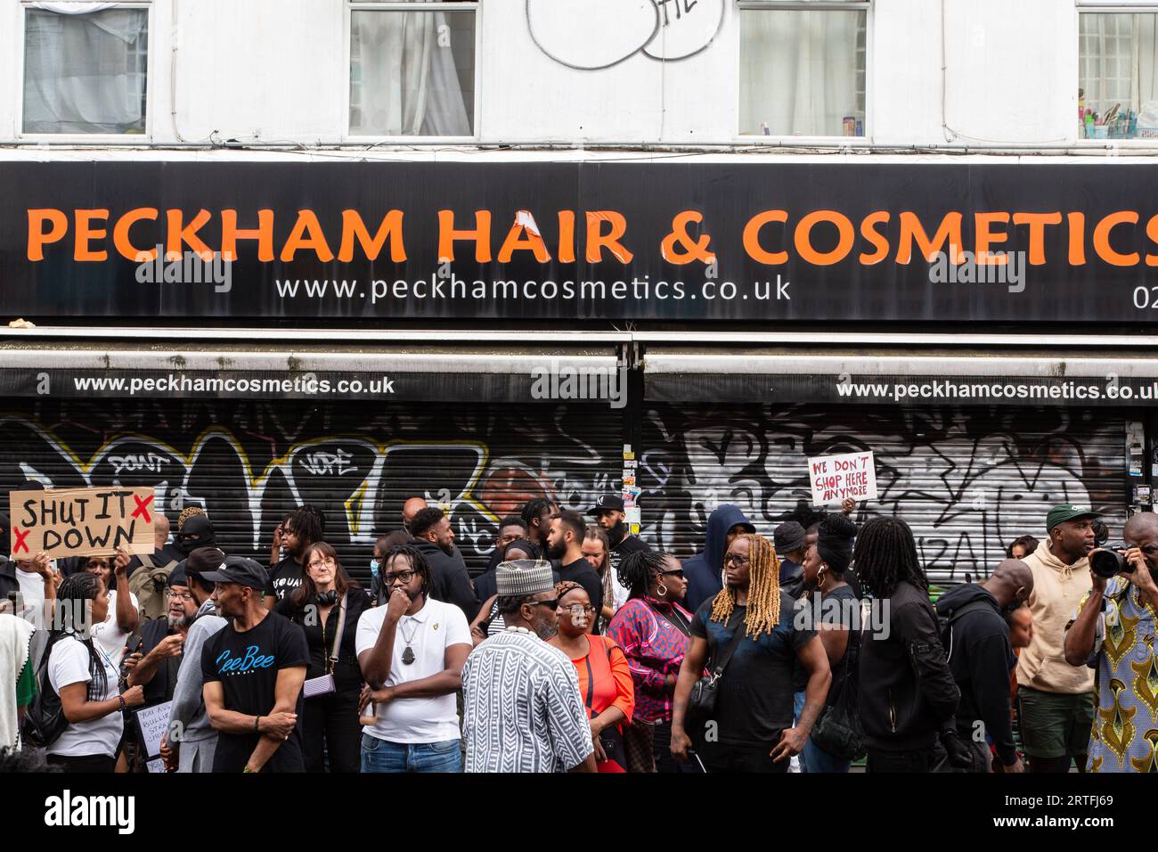 London, UK. 12th Sep, 2023. Protesters gather outside Peckham Hair and ...