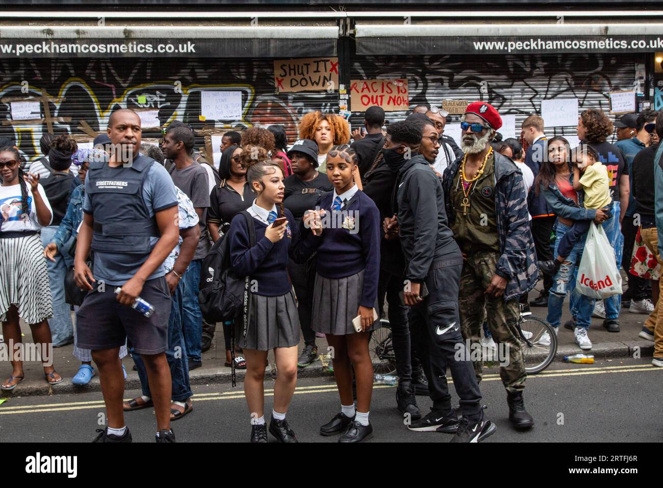London, UK. 12th Sep, 2023. Protesters gather outside Peckham Hair and ...