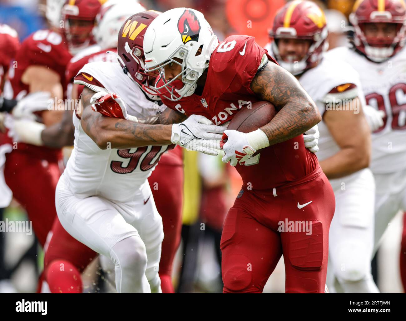 Arizona Cardinals’ RB James Conner (6) with the carry, pushing off ...
