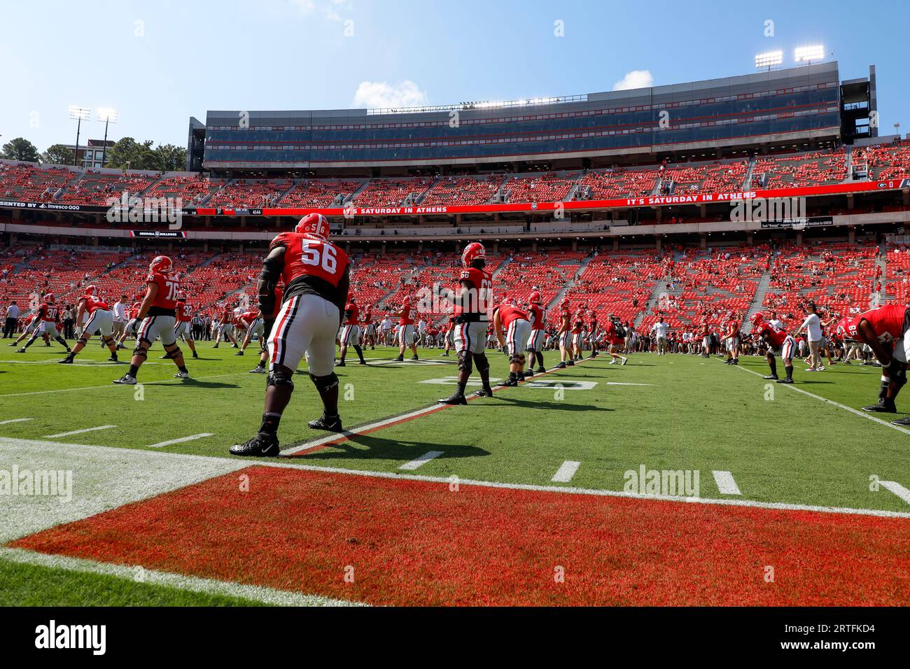 College football players stretching hi-res stock photography and images ...
