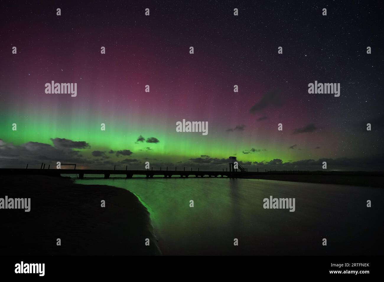 A stunning show of the Northern lights over the refuge hut on the Holy ...