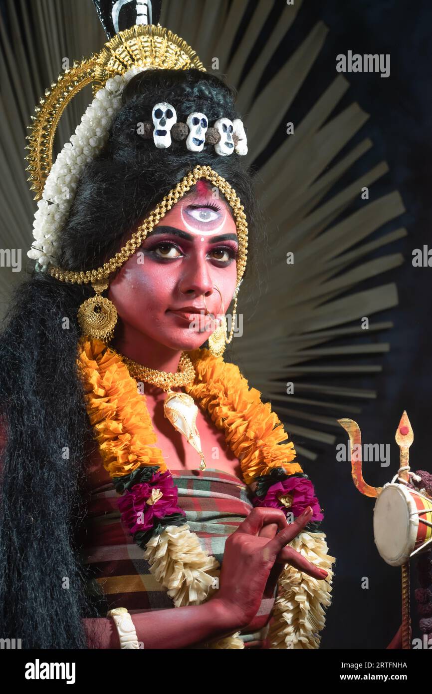 Portrait of beautiful Indian girl of Durga Idol Agomoni Concept Indoor ...
