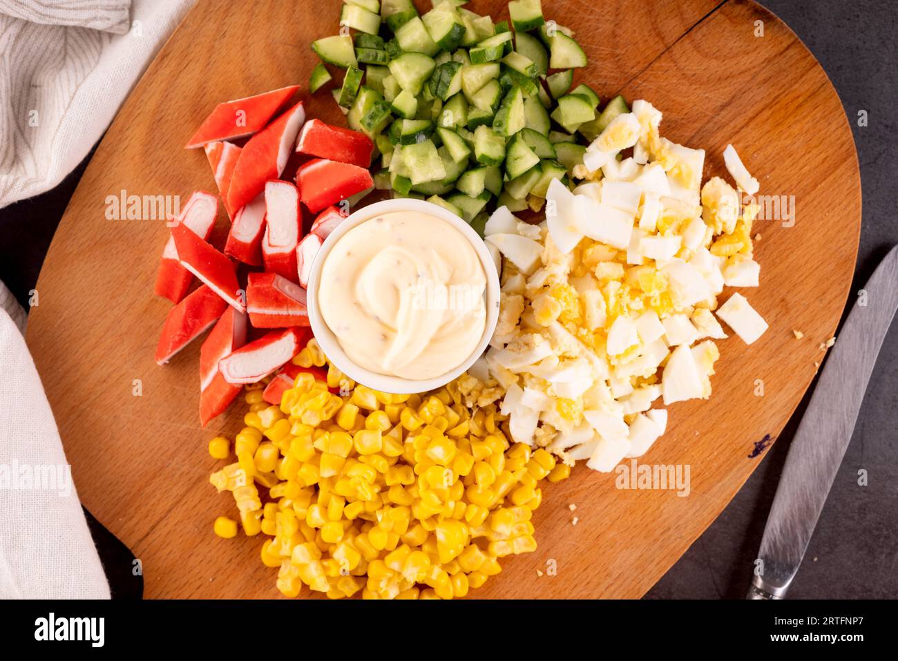 crab sticks salad ingredients: surimi, eggs, corn, cucumber and sause ...