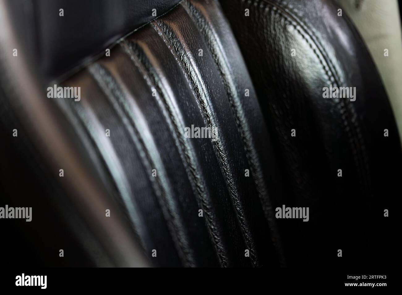 Close-up showcasing the intricate texture and design of a leather seat ...