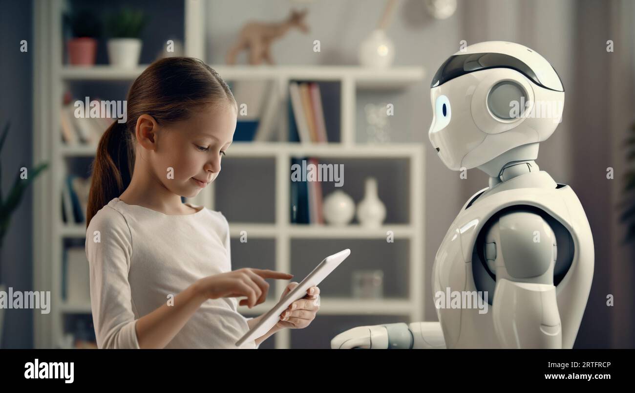 A cute girl is playing with a robot. The concept of future training ...