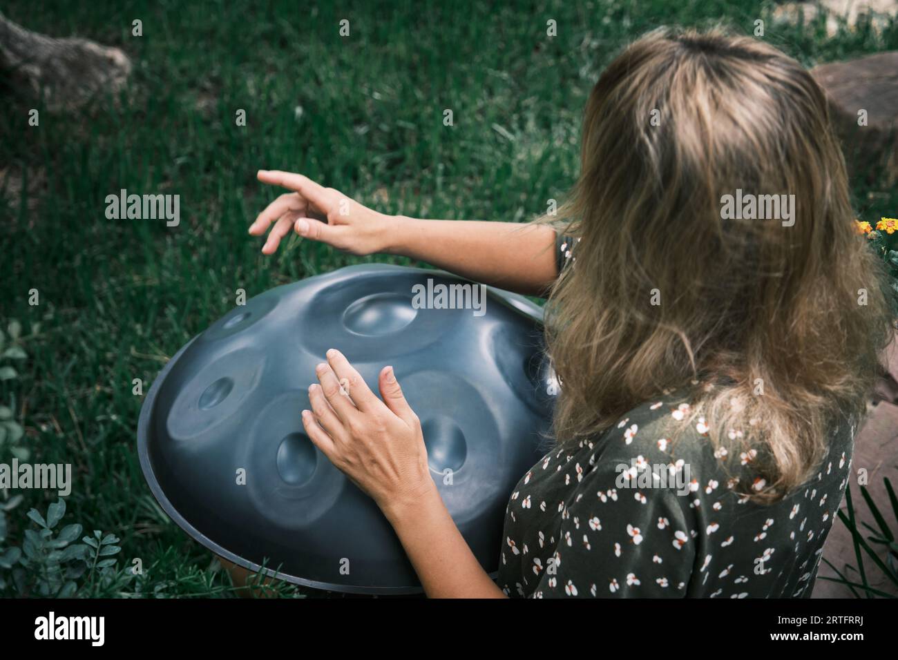 Handpan player hi-res stock photography and images - Alamy