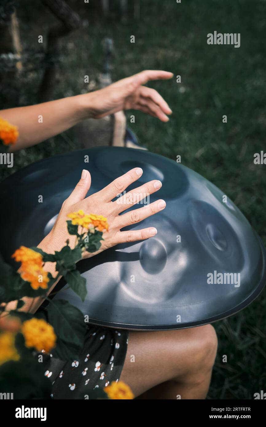 Handpan player hi-res stock photography and images - Alamy