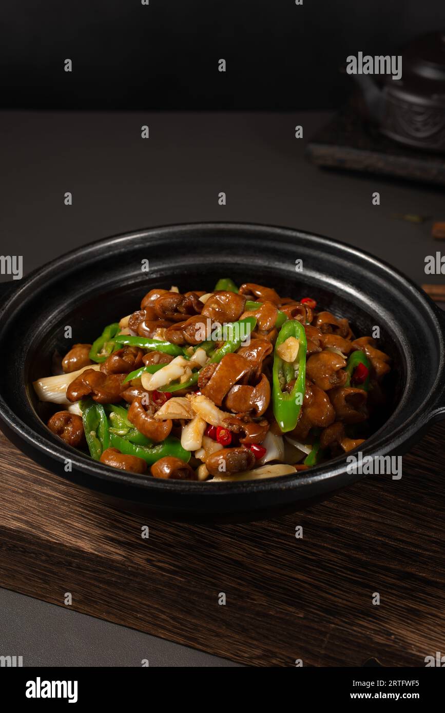 Delicious Chinese food, stir fried pork intestines in casserole Stock ...