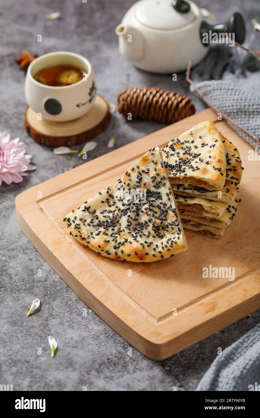 chinese traditional Sesame Cake with Minced chicken salt and pepper ...