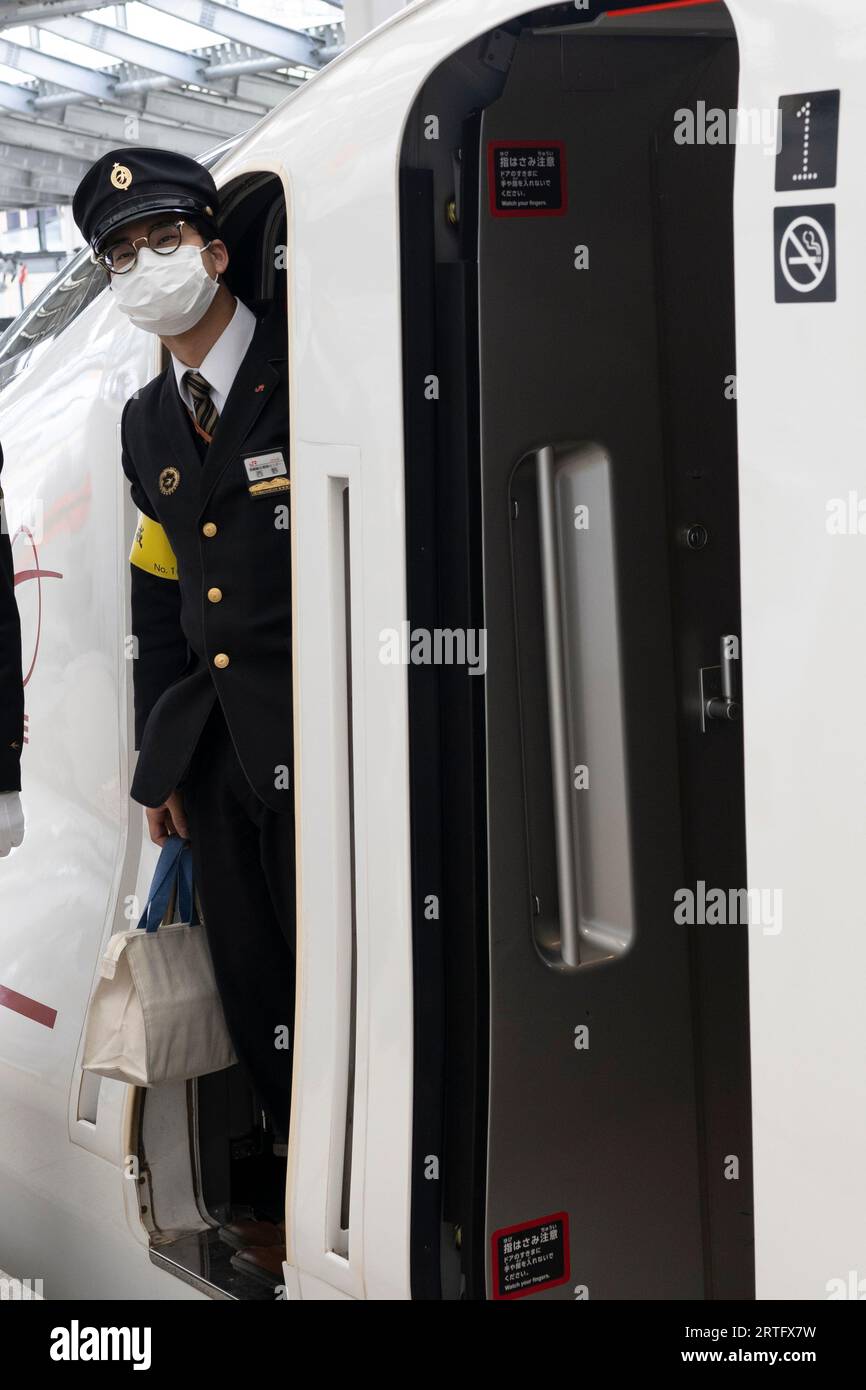 Nagasaki, Japan. 13th Mar, 2023. JR Kyushu employees and train ...