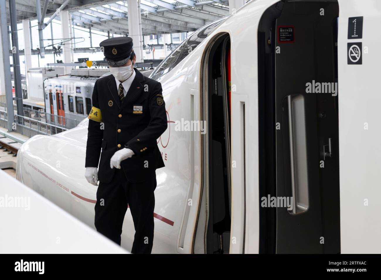 Nagasaki, Japan. 13th Mar, 2023. JR Kyushu employees and train ...