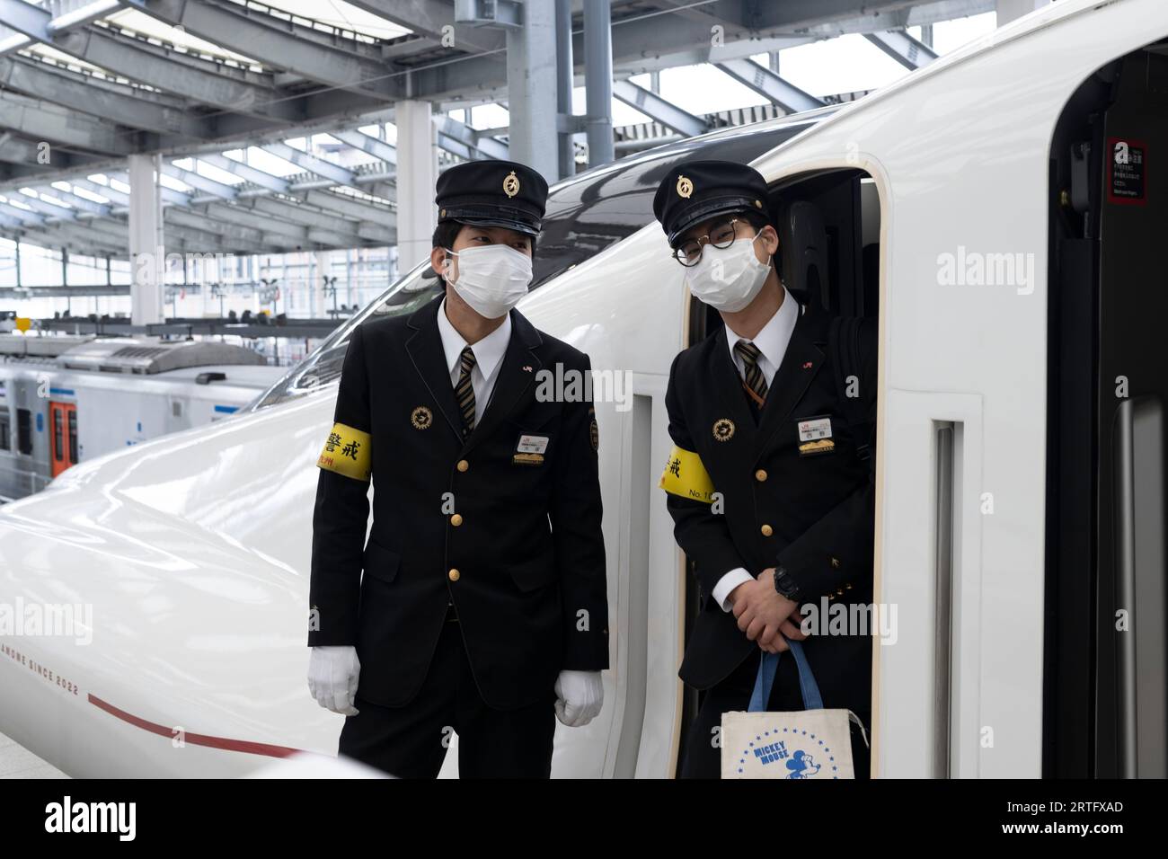 Nagasaki, Japan. 13th Mar, 2023. JR Kyushu employees and train ...