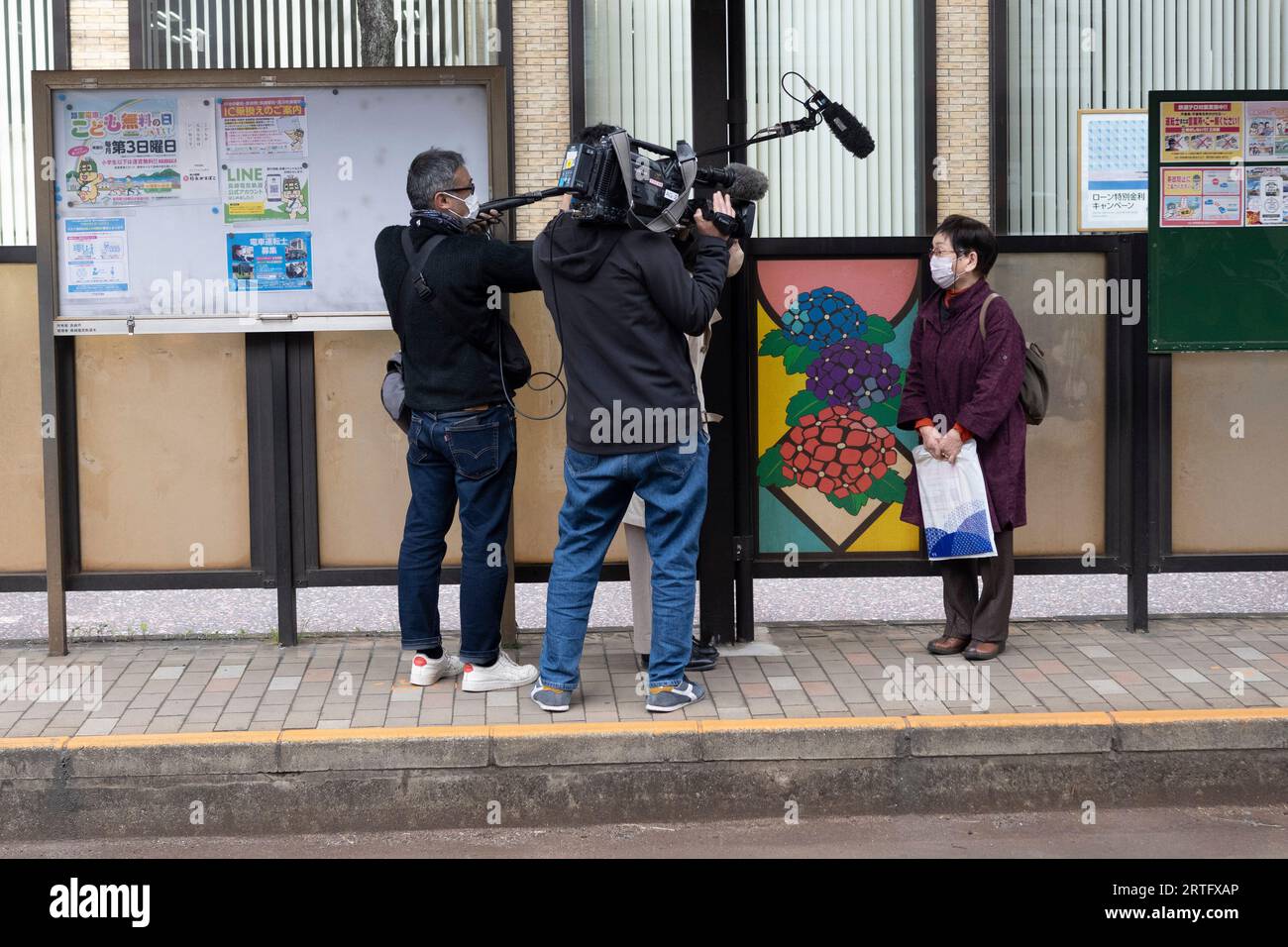 Nagasaki, Japan. 13th Mar, 2023. An NHK broadcasting news crew conducts ...