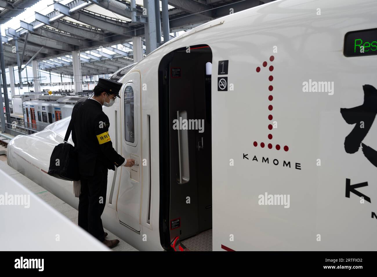 Nagasaki, Japan. 13th Mar, 2023. JR Kyushu employees and train ...