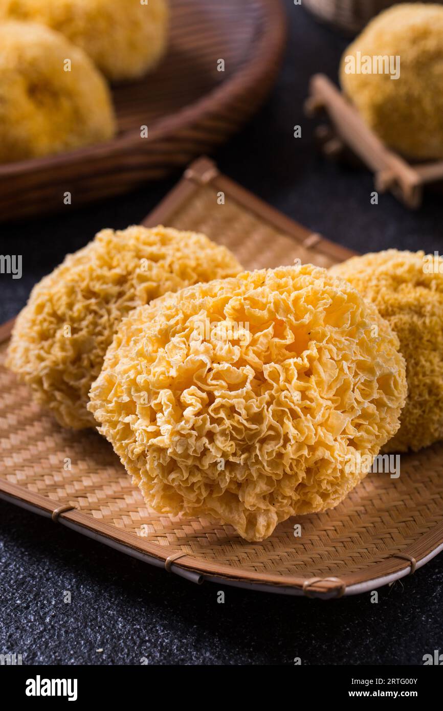 Fresh white fungus (Tremella fuciformis) on a bamboo background Stock ...