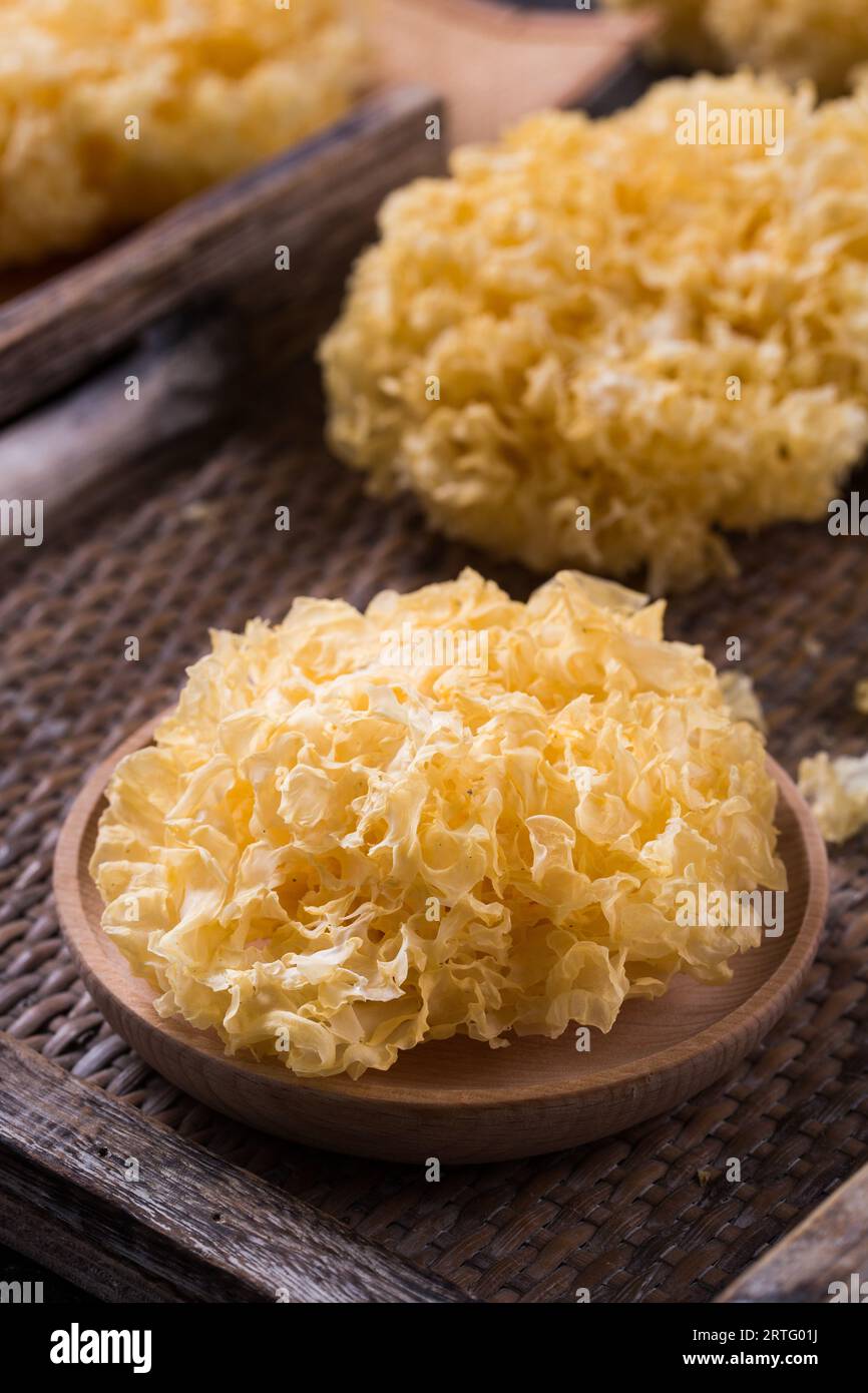 Fresh white fungus (Tremella fuciformis) on a bamboo background Stock ...