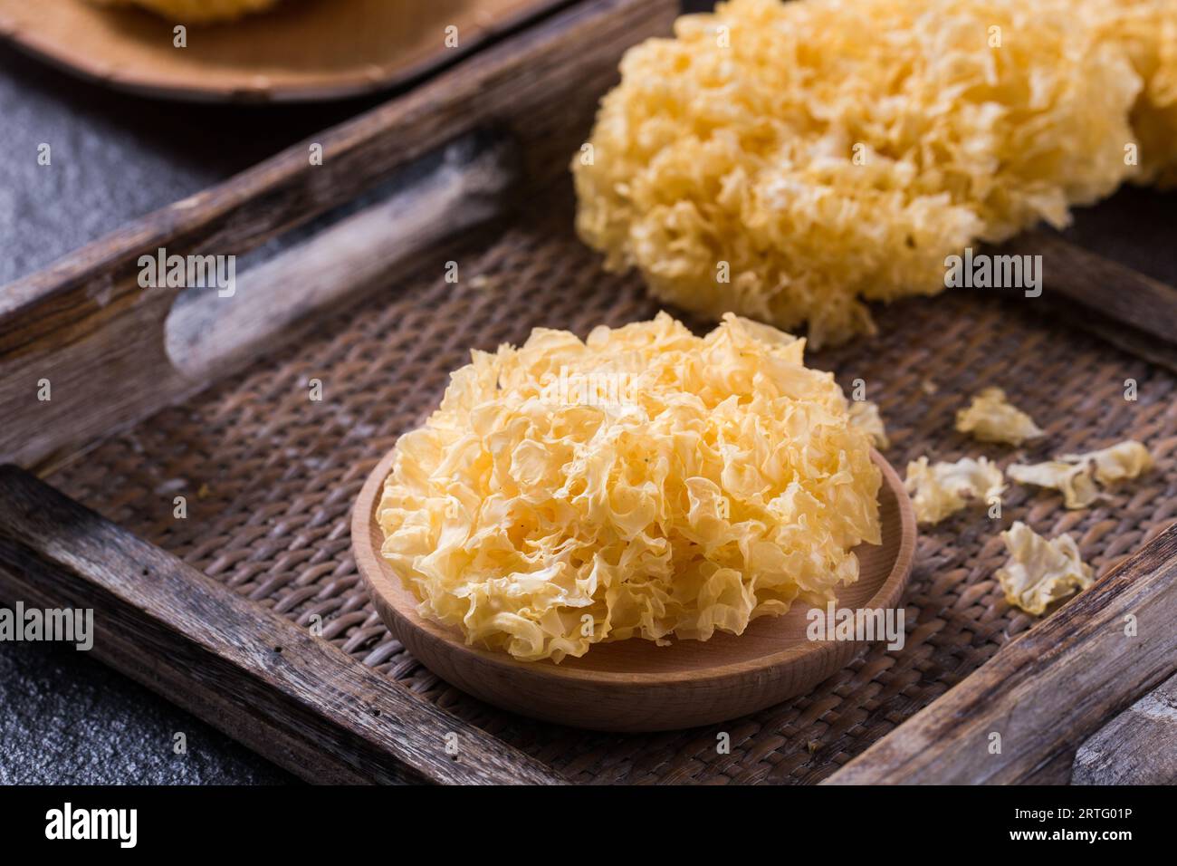 Fresh white fungus (Tremella fuciformis) on a bamboo background Stock ...