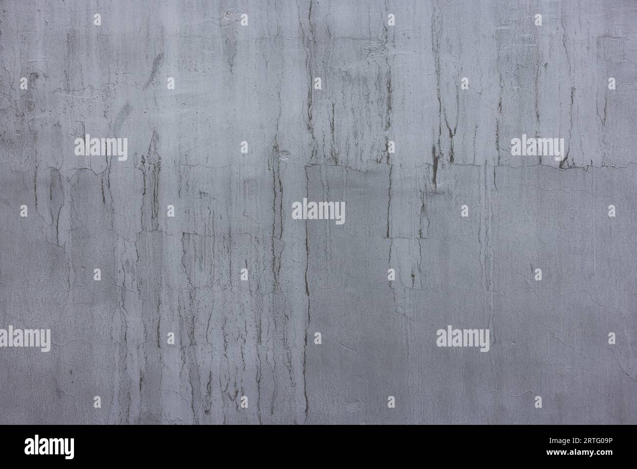 concrete outdoor wall with matte gray paint and black smudges - full ...