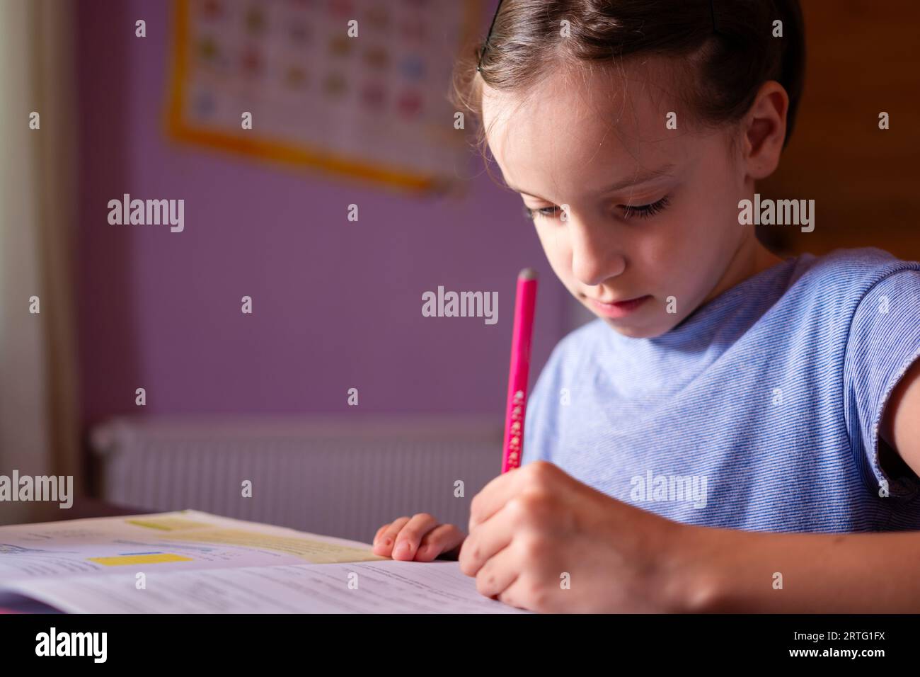 Left handed girl homework hi-res stock photography and images - Alamy