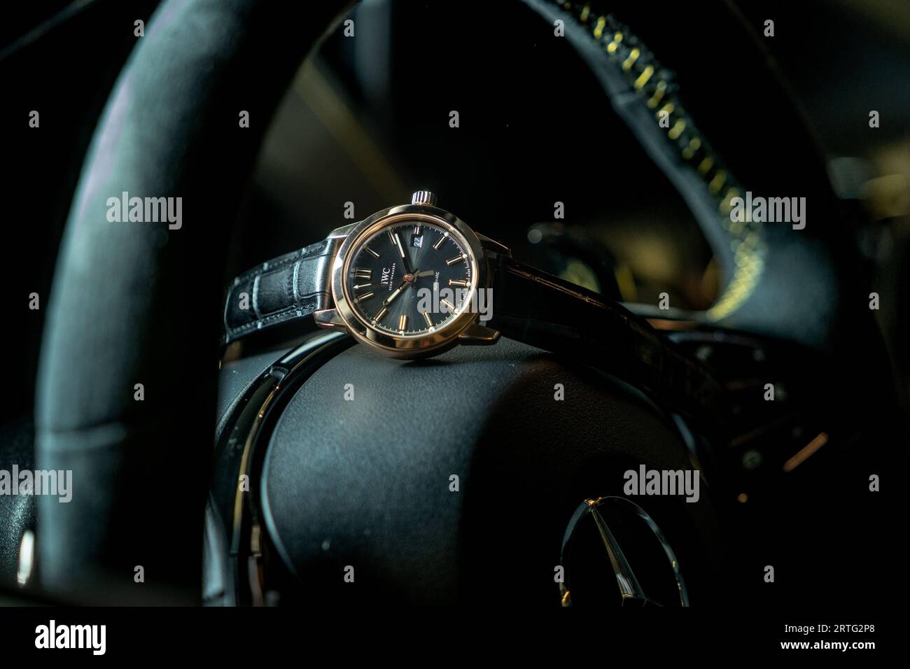 IWC Ingenieur watches shot with Mercedes AMG cars Stock Photo - Alamy
